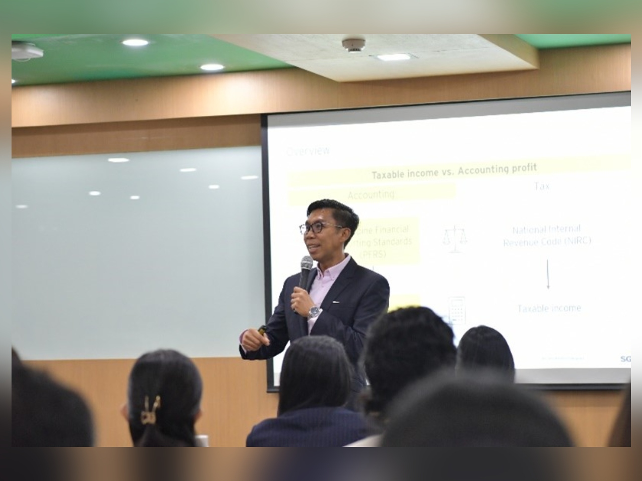 Aaron C. Escartin facilitates income tax seminar | SGV & Co. | EY ...